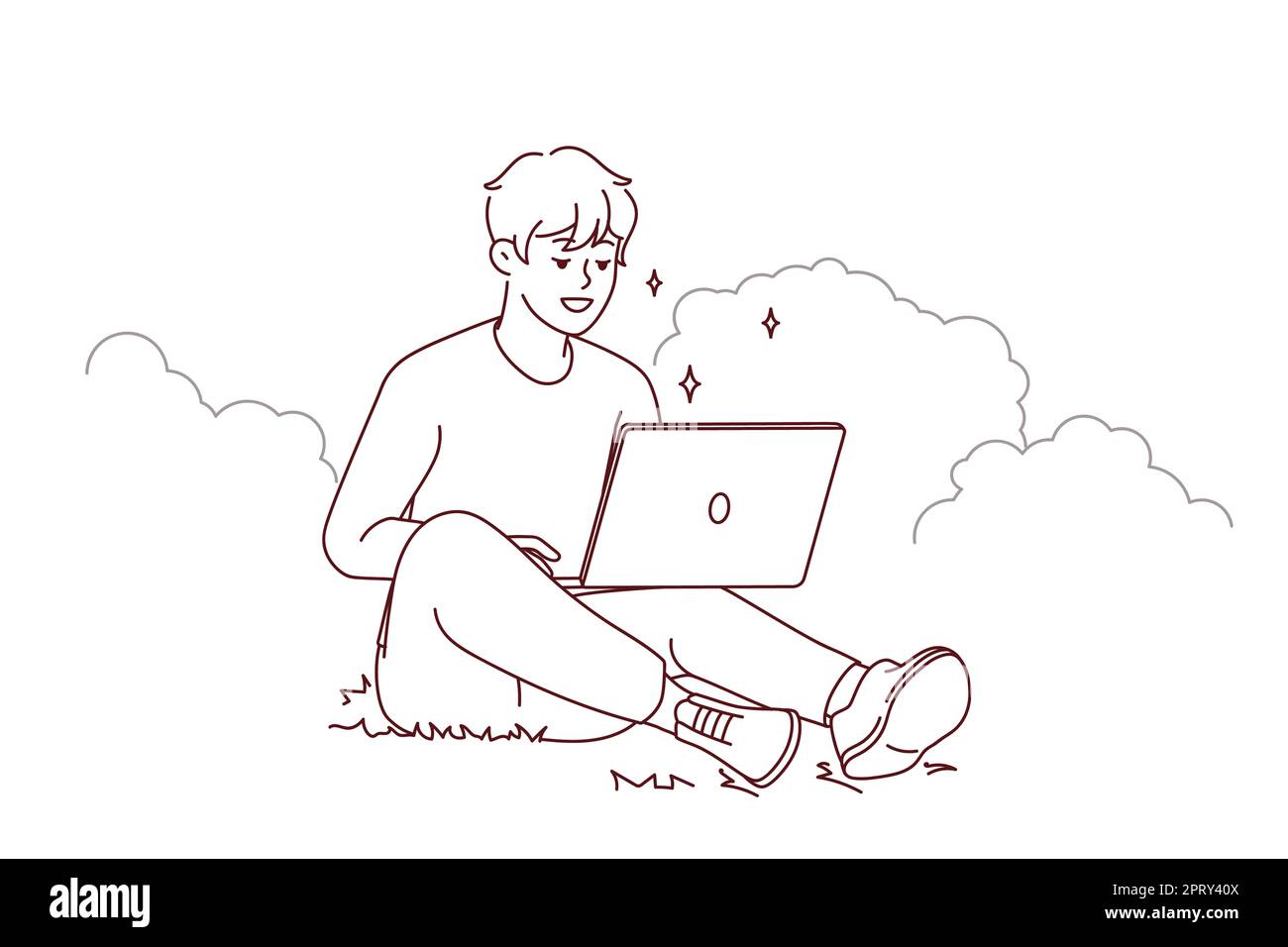 Smiling young man sit on grass in park working on laptop. Happy guy ...