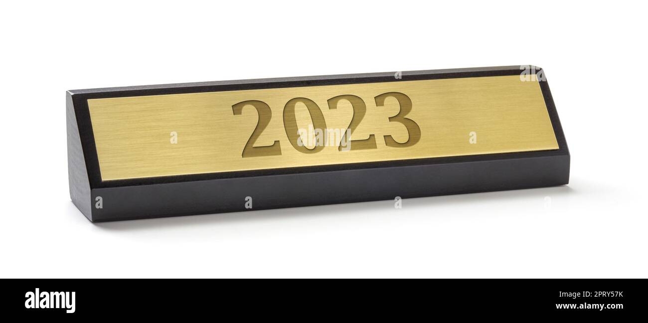 A name plate on a white background with the engraving 2023 Stock Photo ...