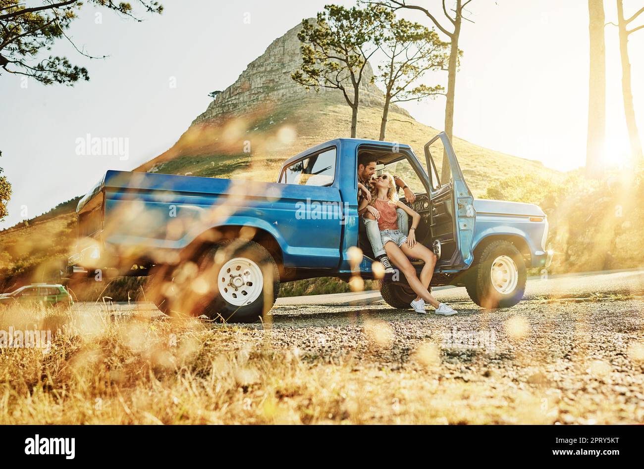 This destination sets the scene for a beautiful road trip. a young ...