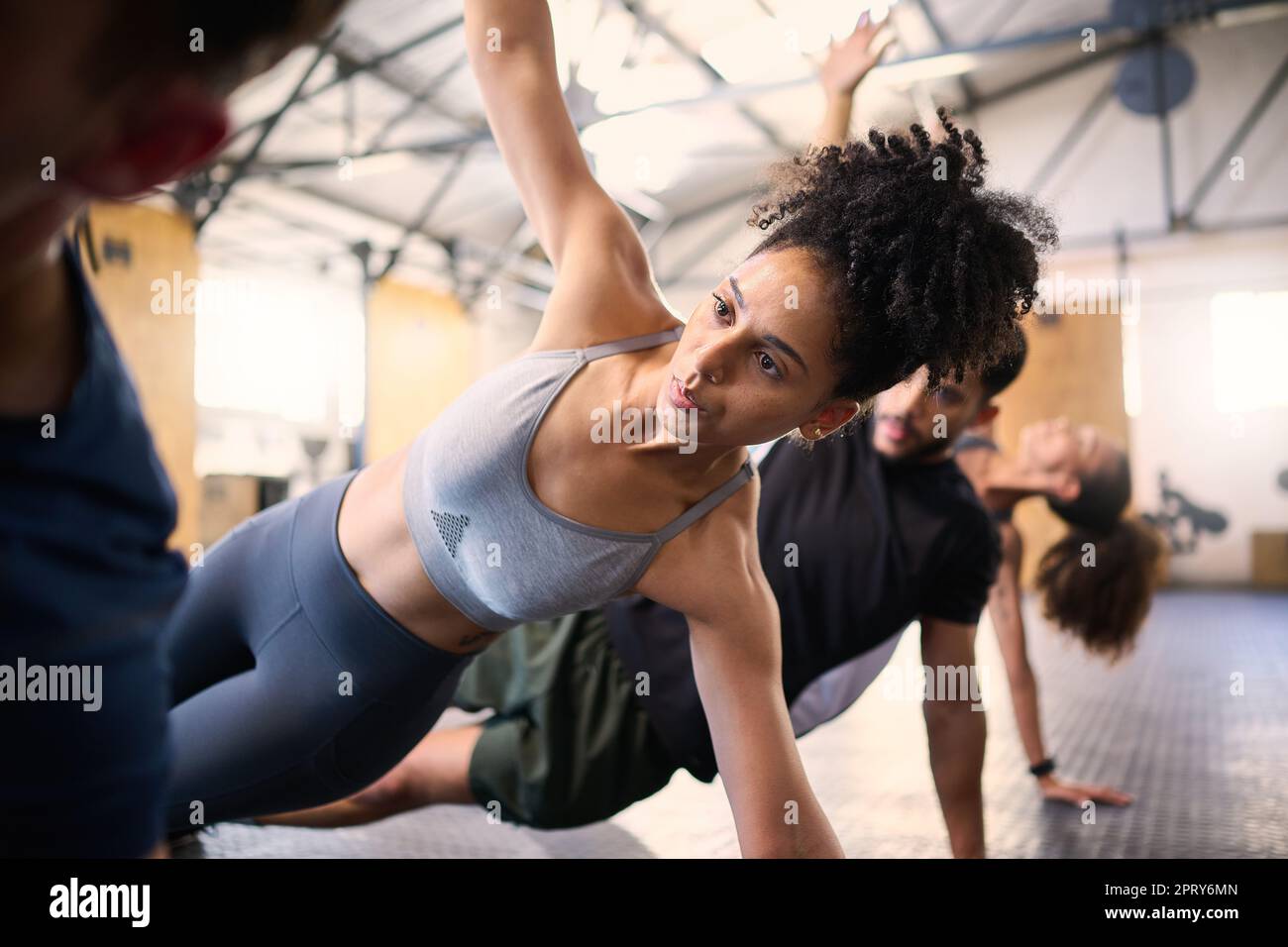 Fitness, active and healthy friends stretching, exercising or cardio ...