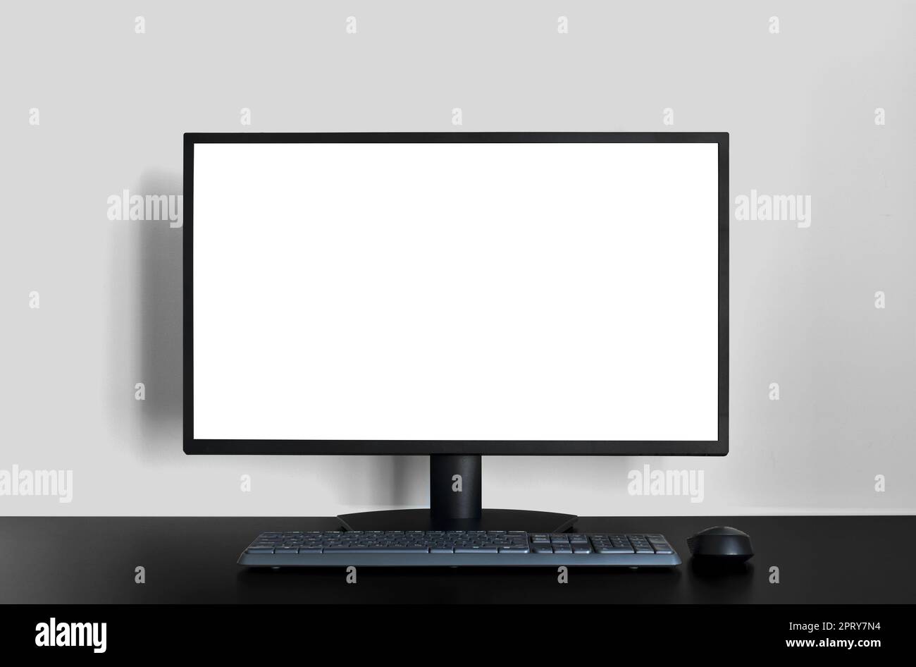 Desktop Screen Template Mockup on Gray Wall Background Stock Photo - Alamy