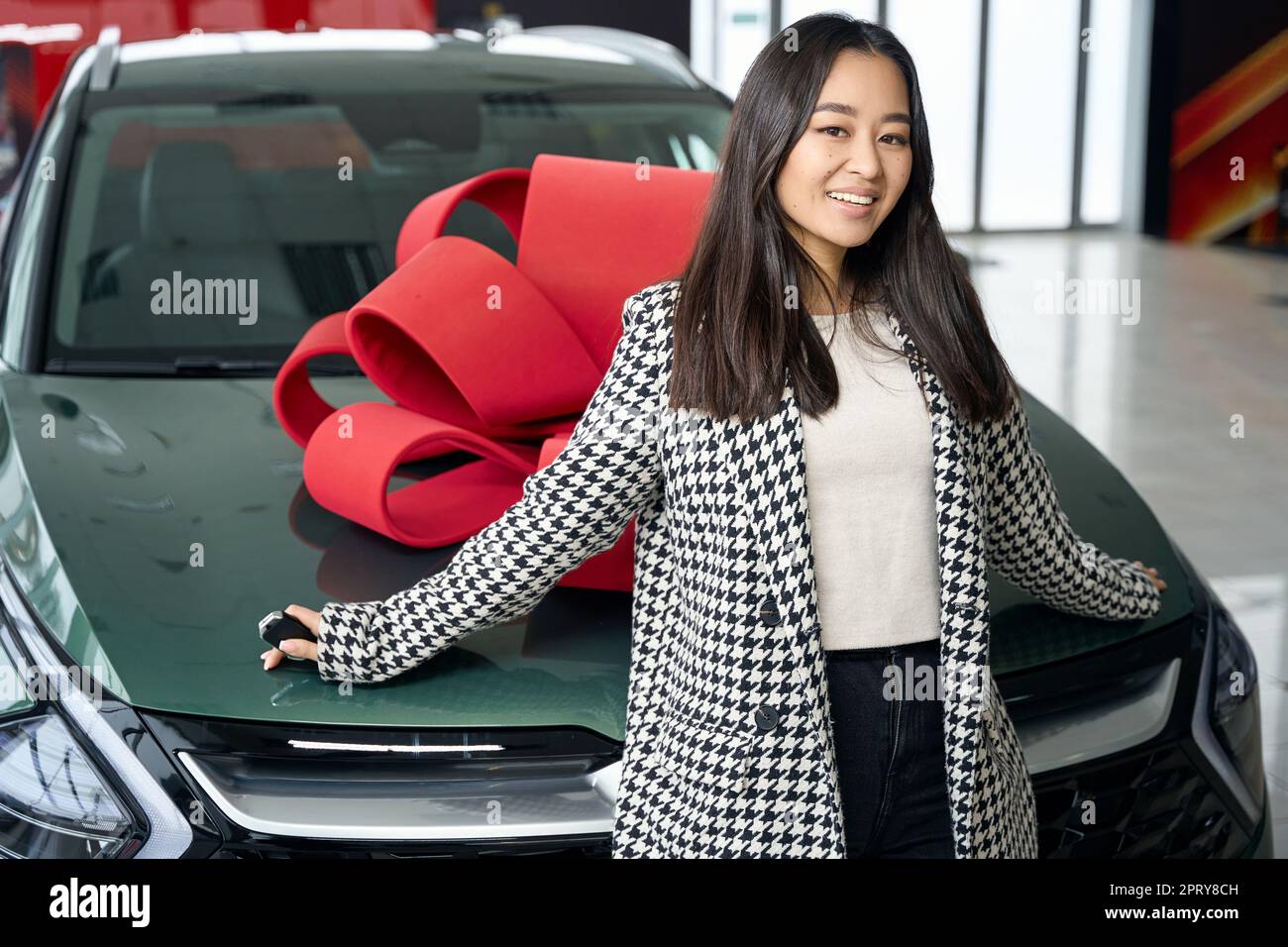 Car service young manager stands hi-res stock photography and images ...