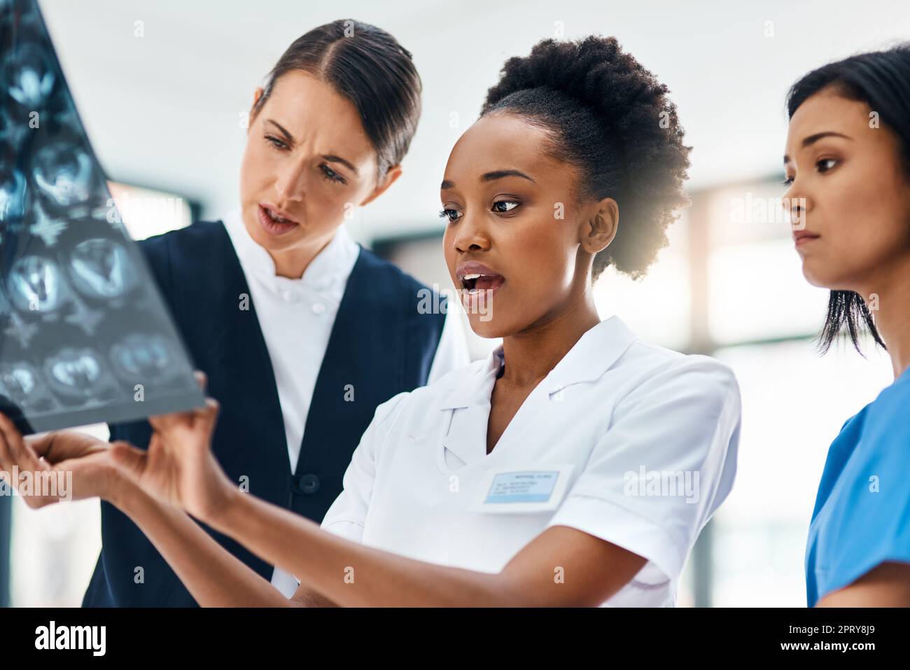 Spotting the injury wasnt hard. medical practitioners looking at a ...