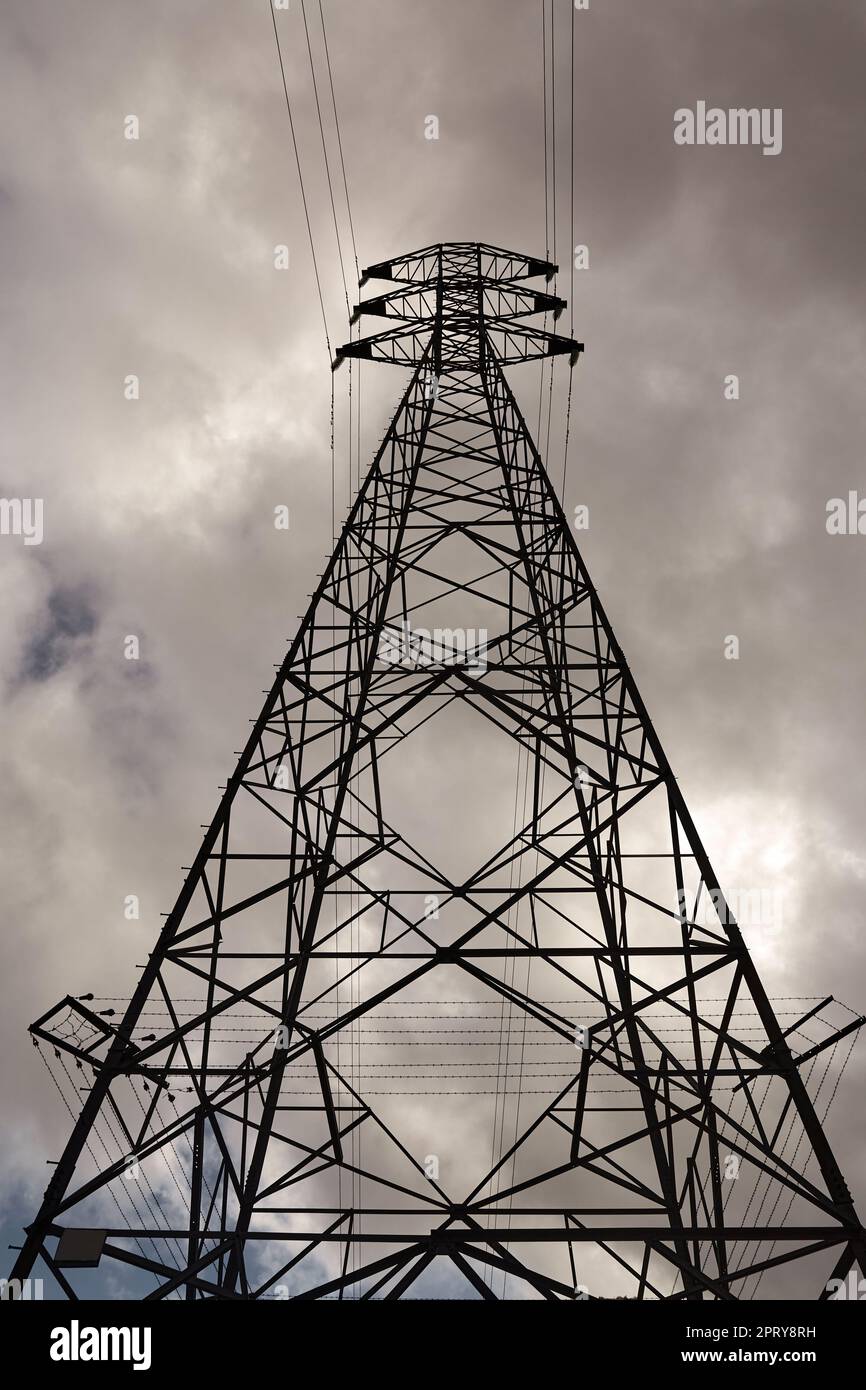 Power line wires electricity pylon low angle view Stock Photo - Alamy