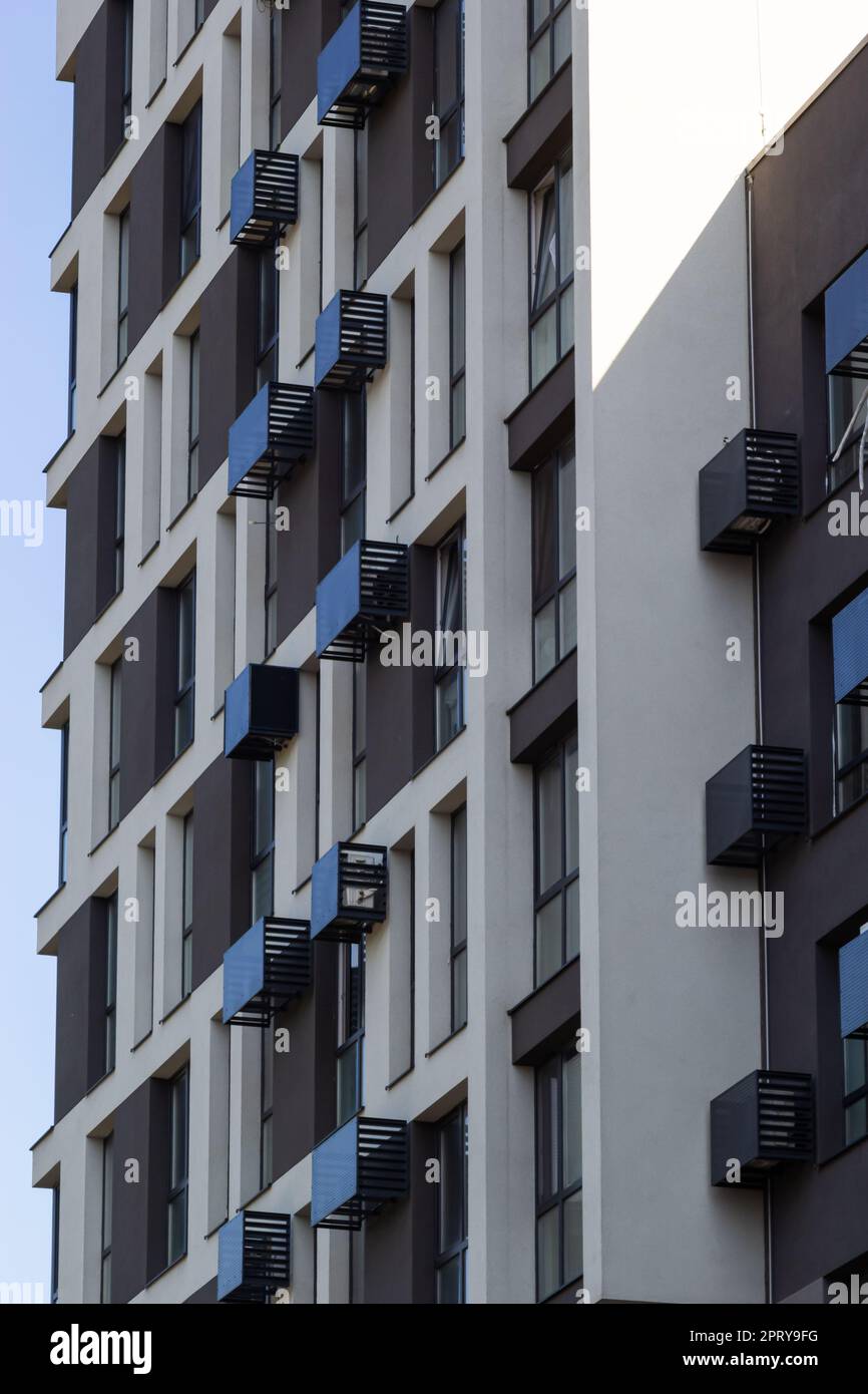 Architectural details of modern high apartment building facade with ...