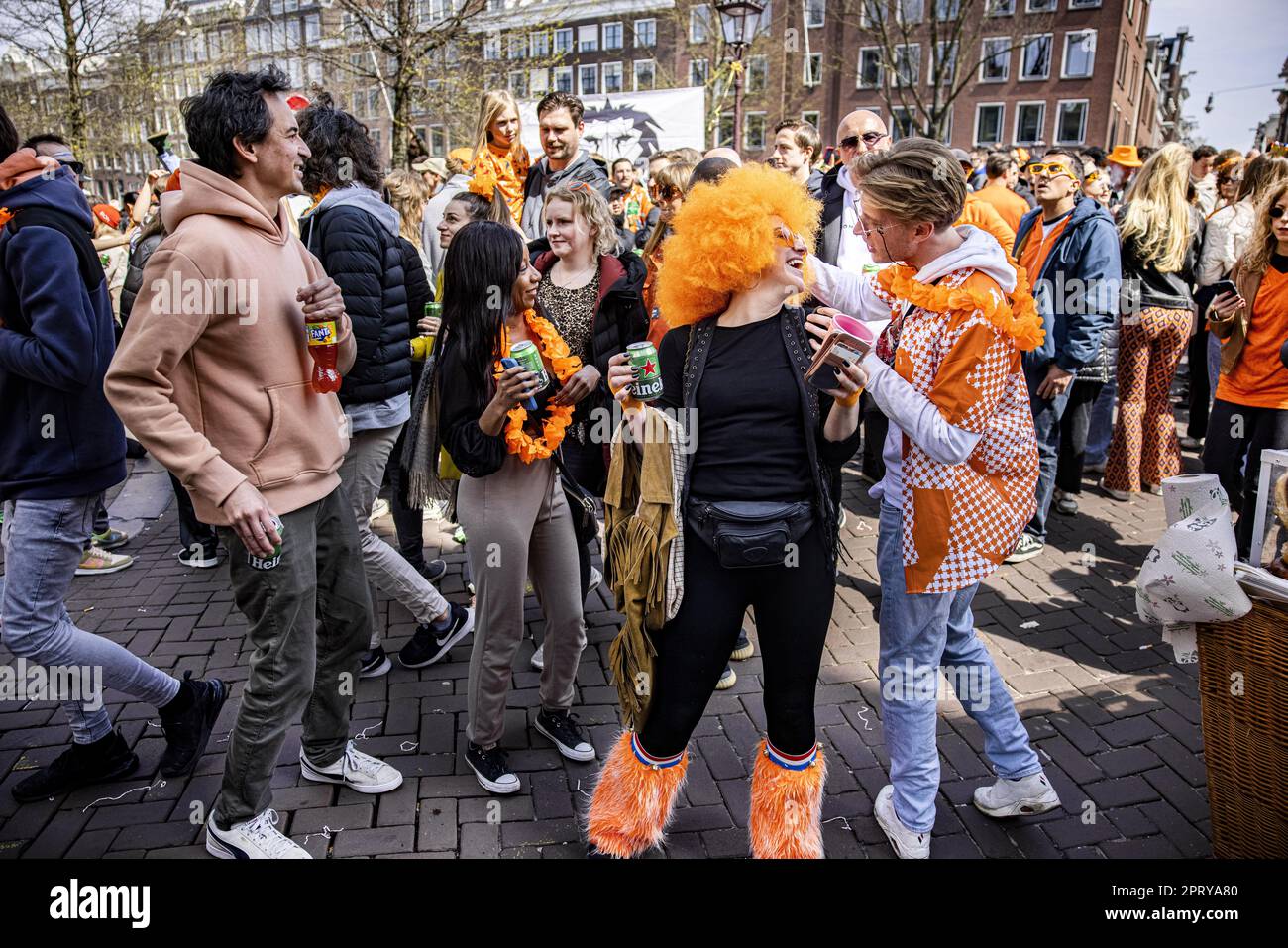 AMSTERDAM - Revelers in the center of the capital on King's Day. Stages ...