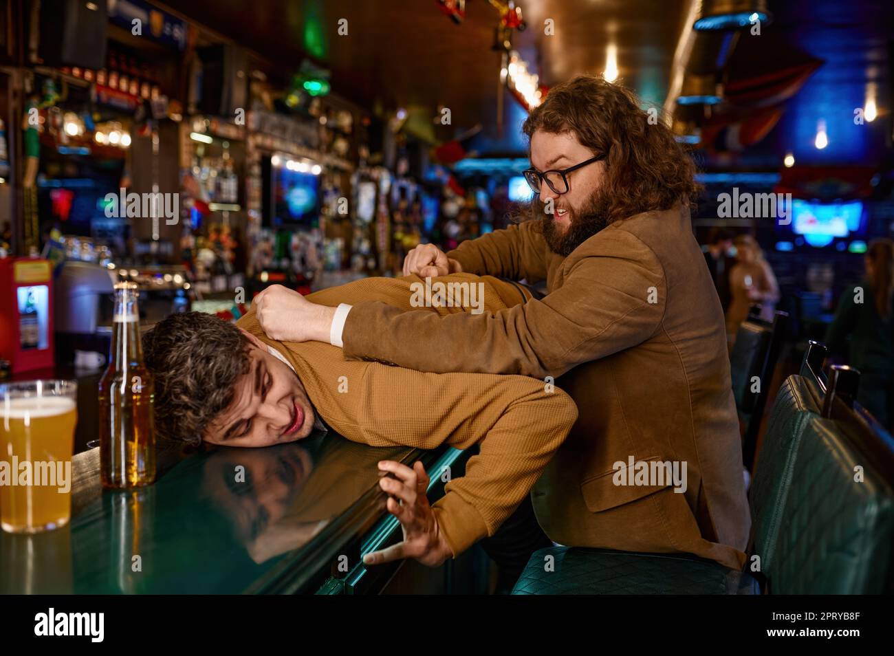 Soccer fans fight. Aggressive man pulling guy on bar counter. Friends ...