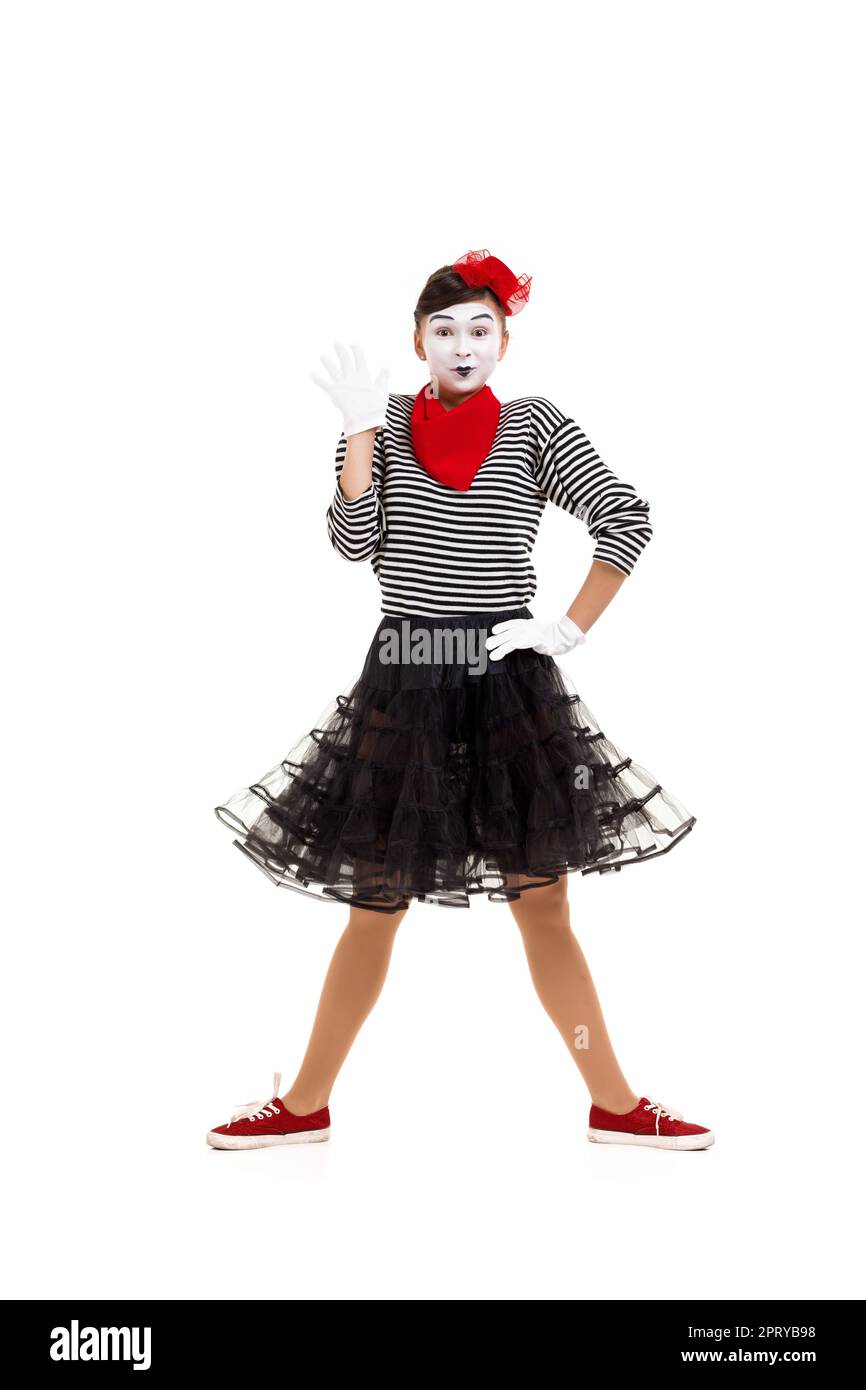 Full length portrait of a mime woman artist looking at camera isolated ...