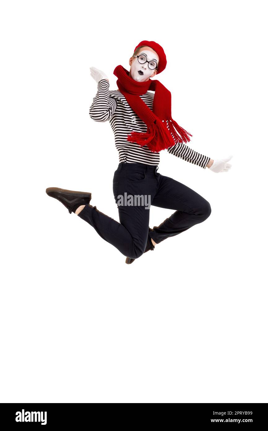 Full length portrait of mime woman artist jumping isolated on white ...