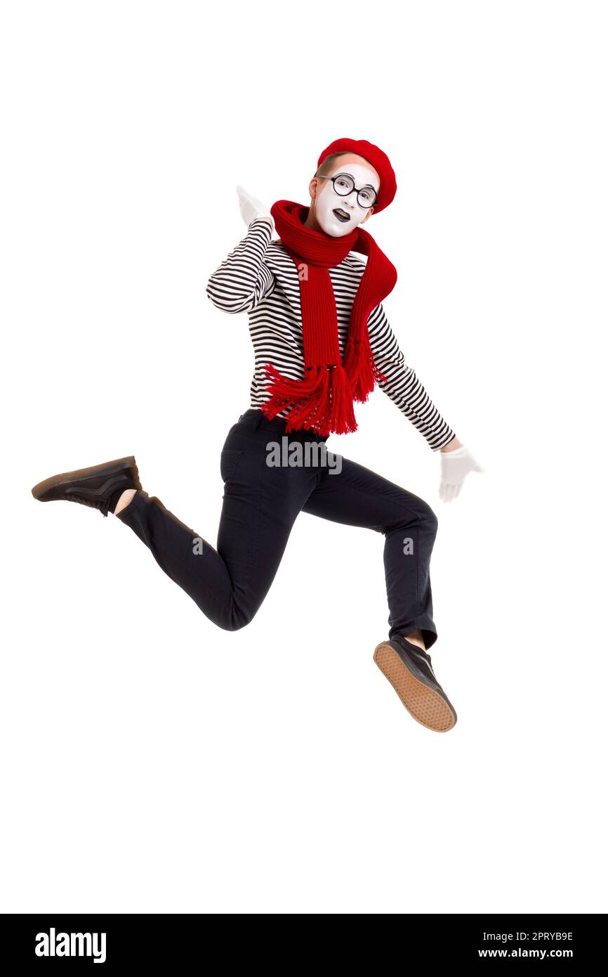 Full length portrait of mime woman artist jumping isolated on white ...