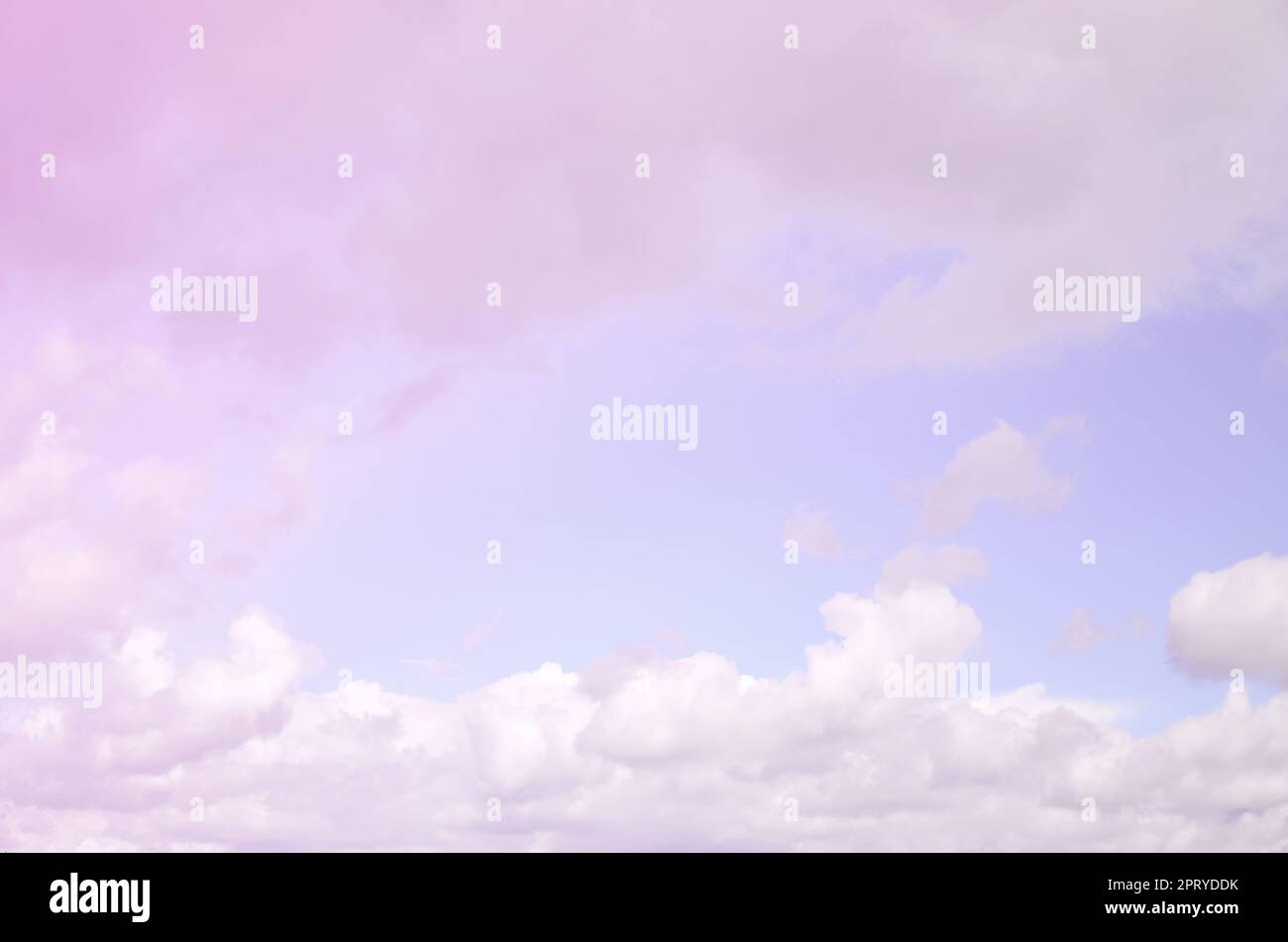 Heavenly space of blue color with a lot of thick white clouds ...