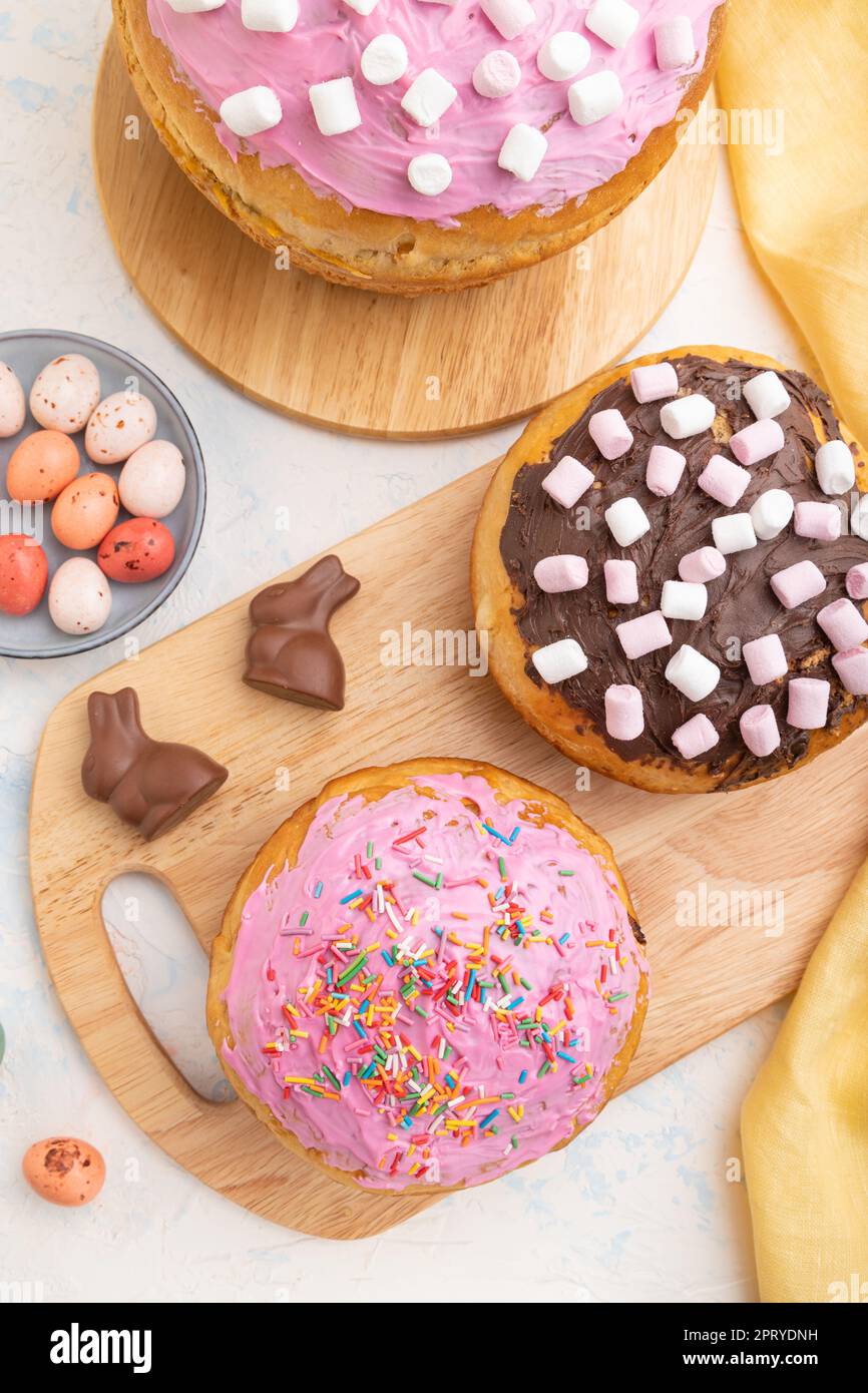 Homemade glazed and decorated easter pies with chocolate eggs and ...