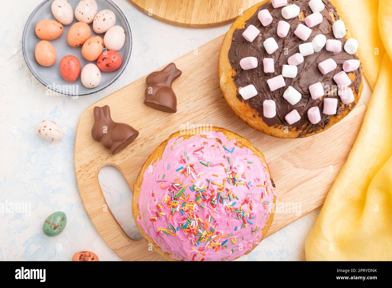 Homemade glazed and decorated easter pies with chocolate eggs and ...