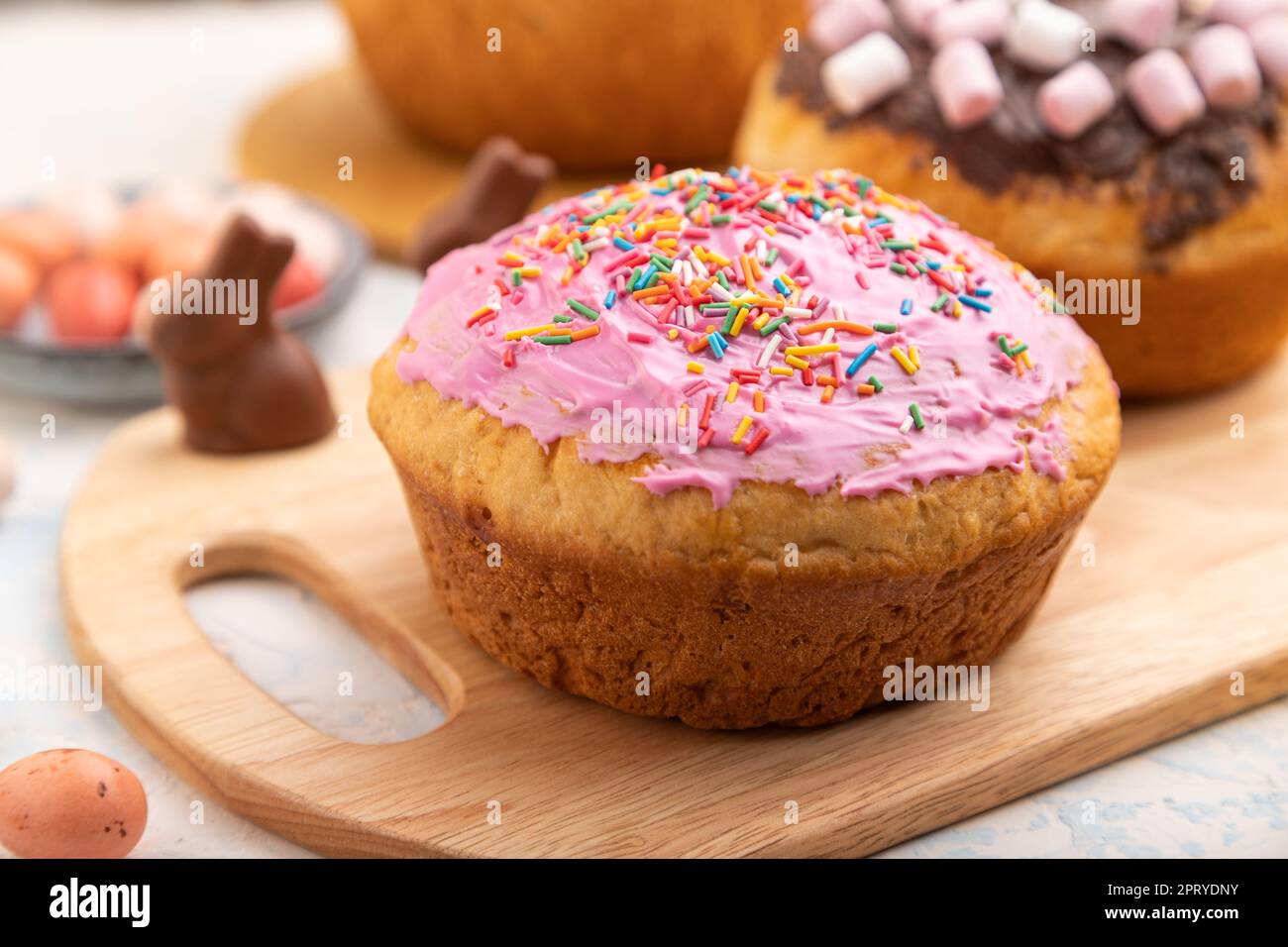 Homemade glazed and decorated easter pies with chocolate eggs and ...