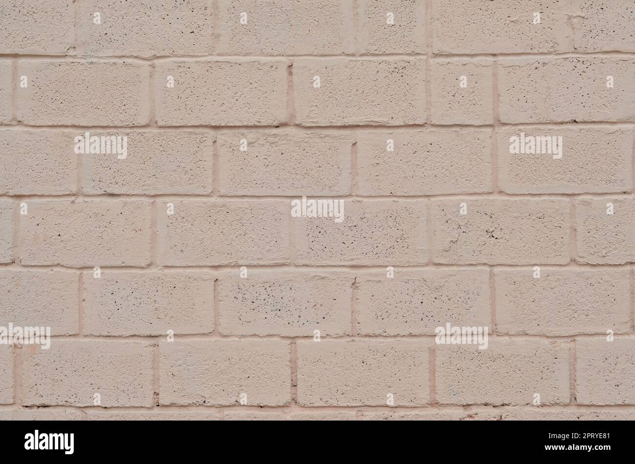Weathered stained old colored beige block wall background. Texture of ...