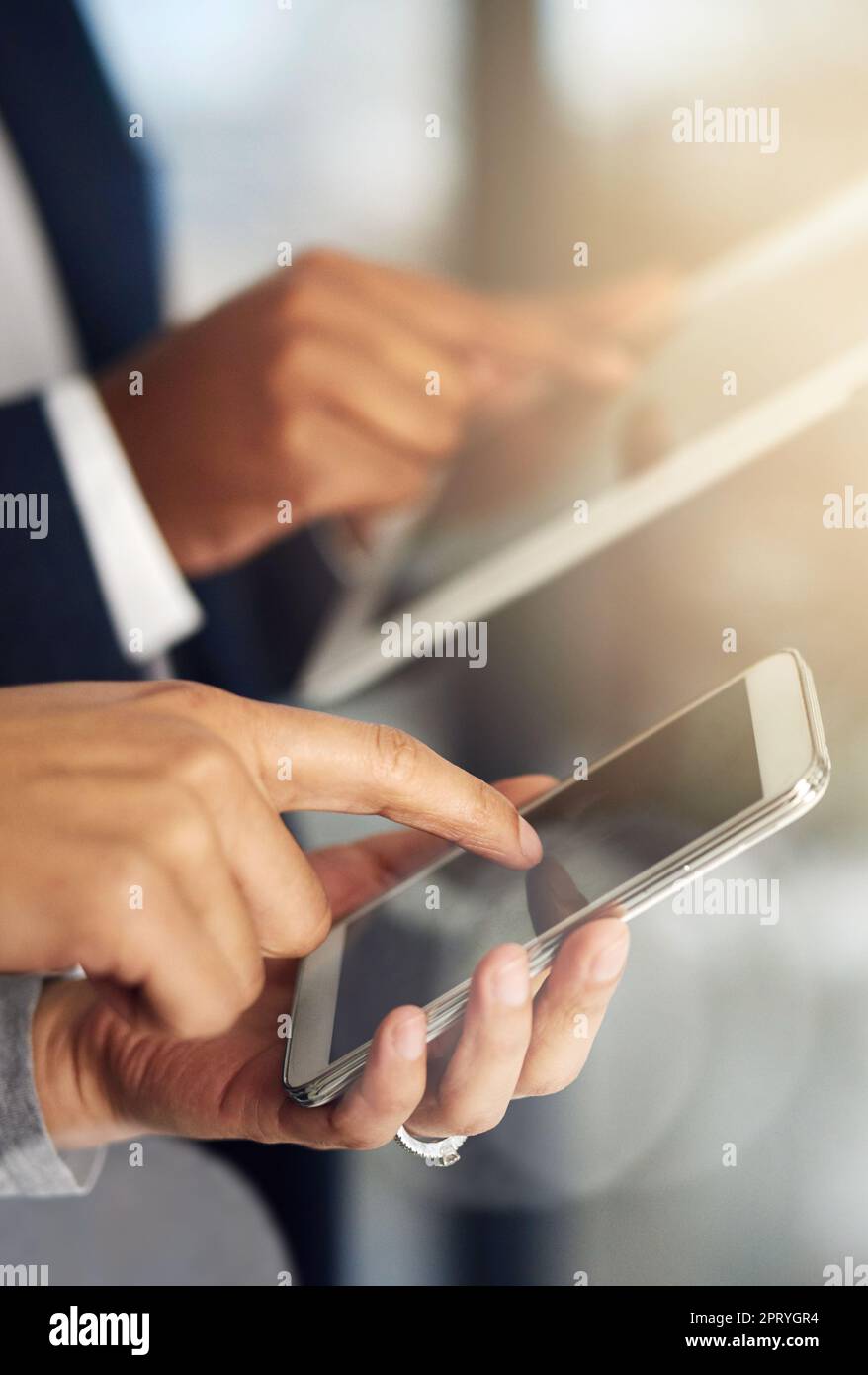 Smart business demands smart devices. businesspeople using their ...
