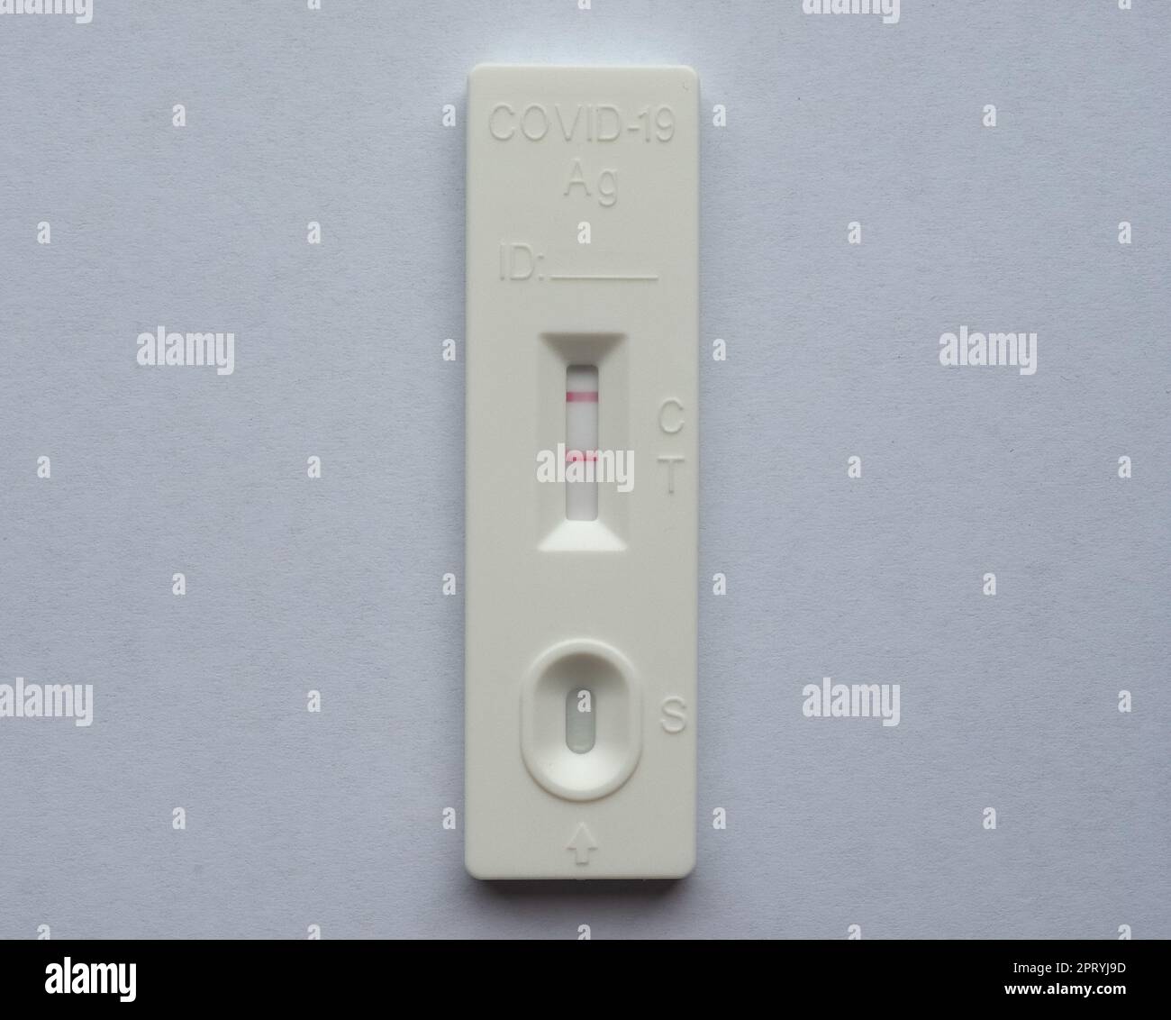 Positive Covid 19 antigen rapid test specimen well Stock Photo - Alamy