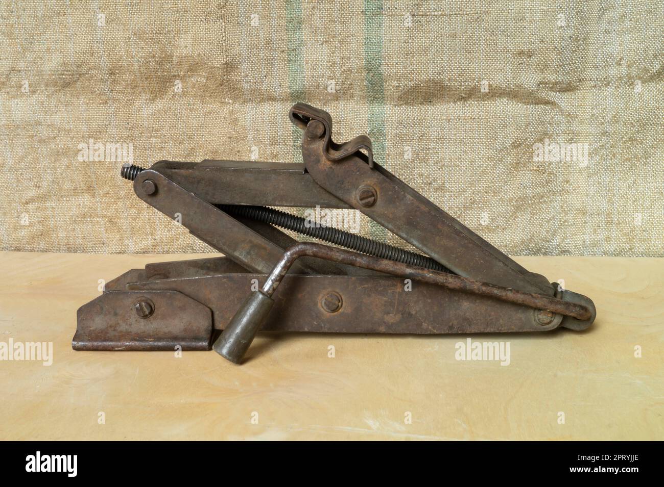 An iron tool for car repair. Industrial steel parts close-up. Device ...