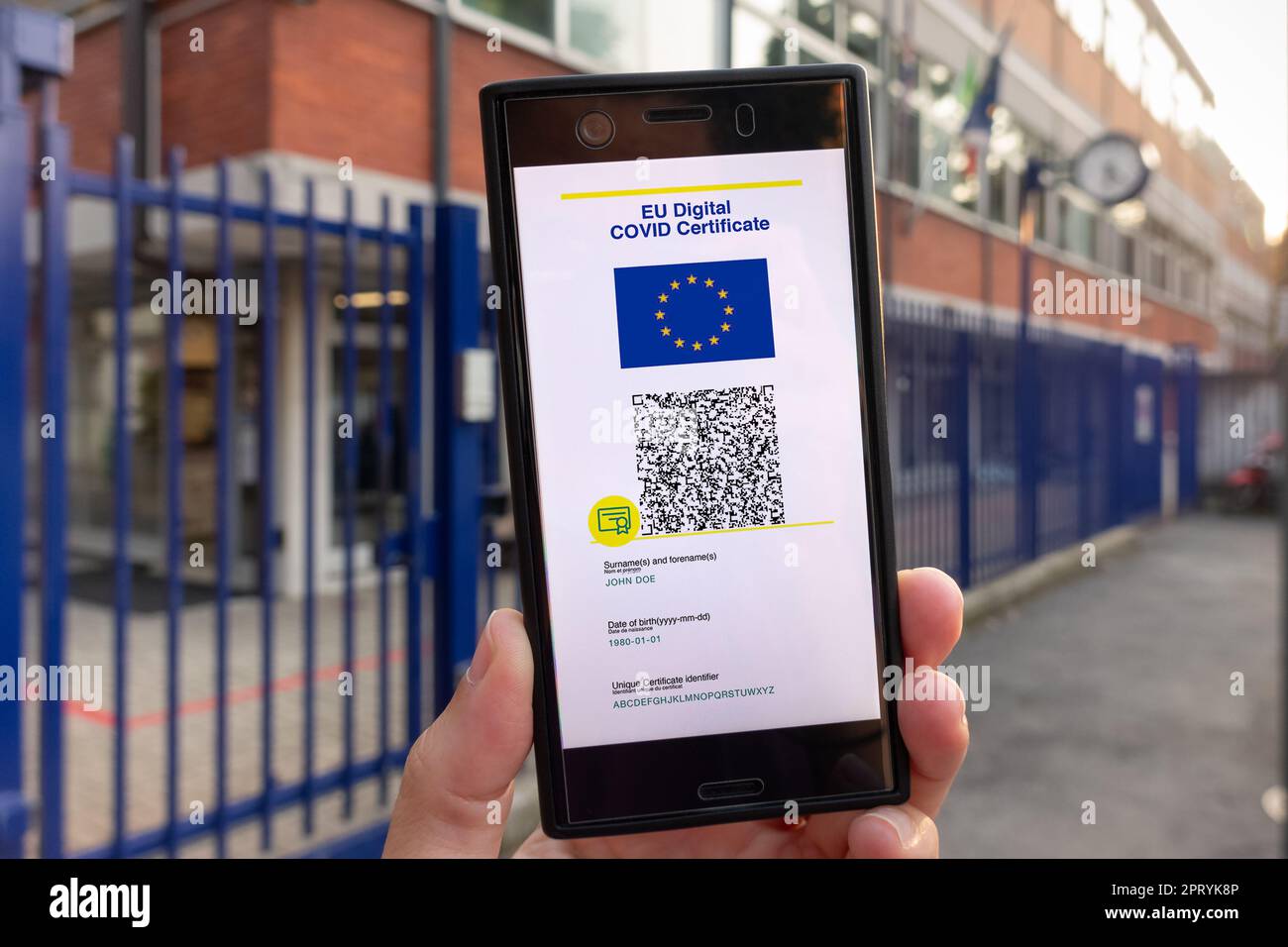 Woman showing on smartphone EU Digital Covid Certificate Green Pass ...