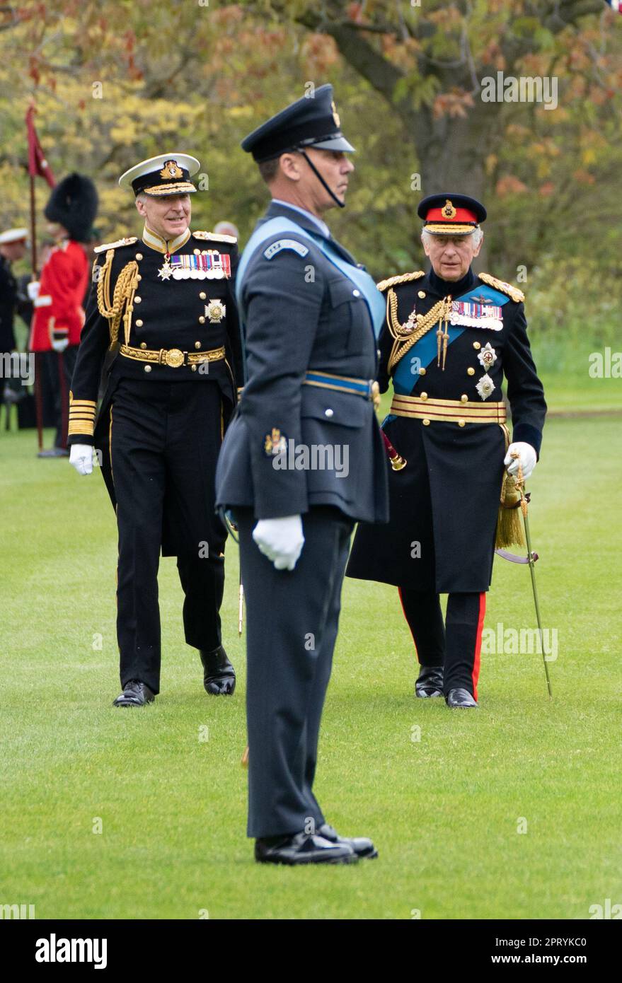 King Charles III (right) attends a ceremony to present new Standards ...