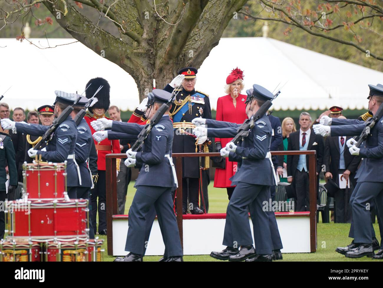 King Charles III and the Queen Consort, receiving a Royal Salute from ...