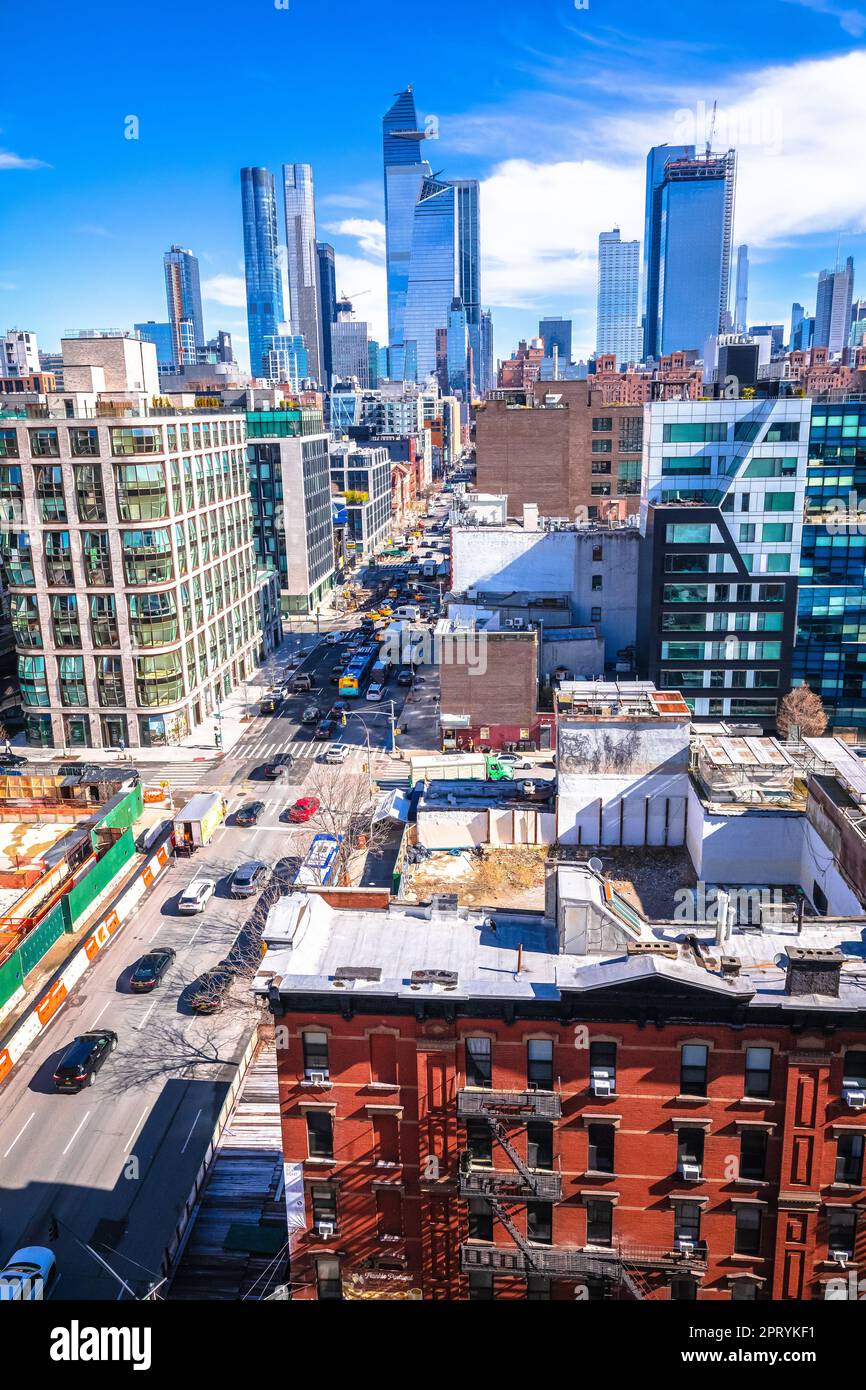 New York City busy street and Hudson Yards skyline development view ...