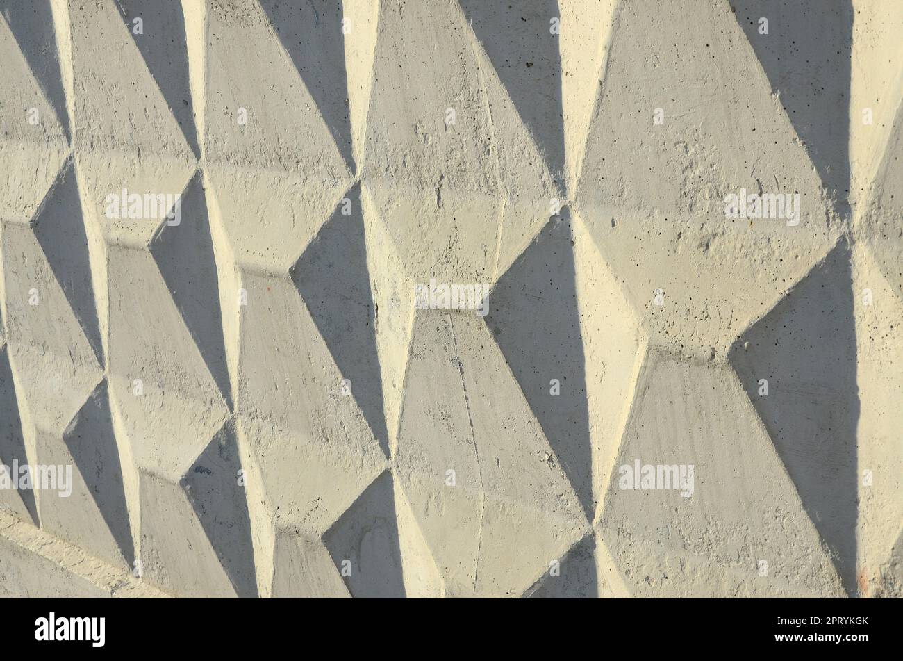 Texture of a relief concrete wall of beige color Stock Photo - Alamy