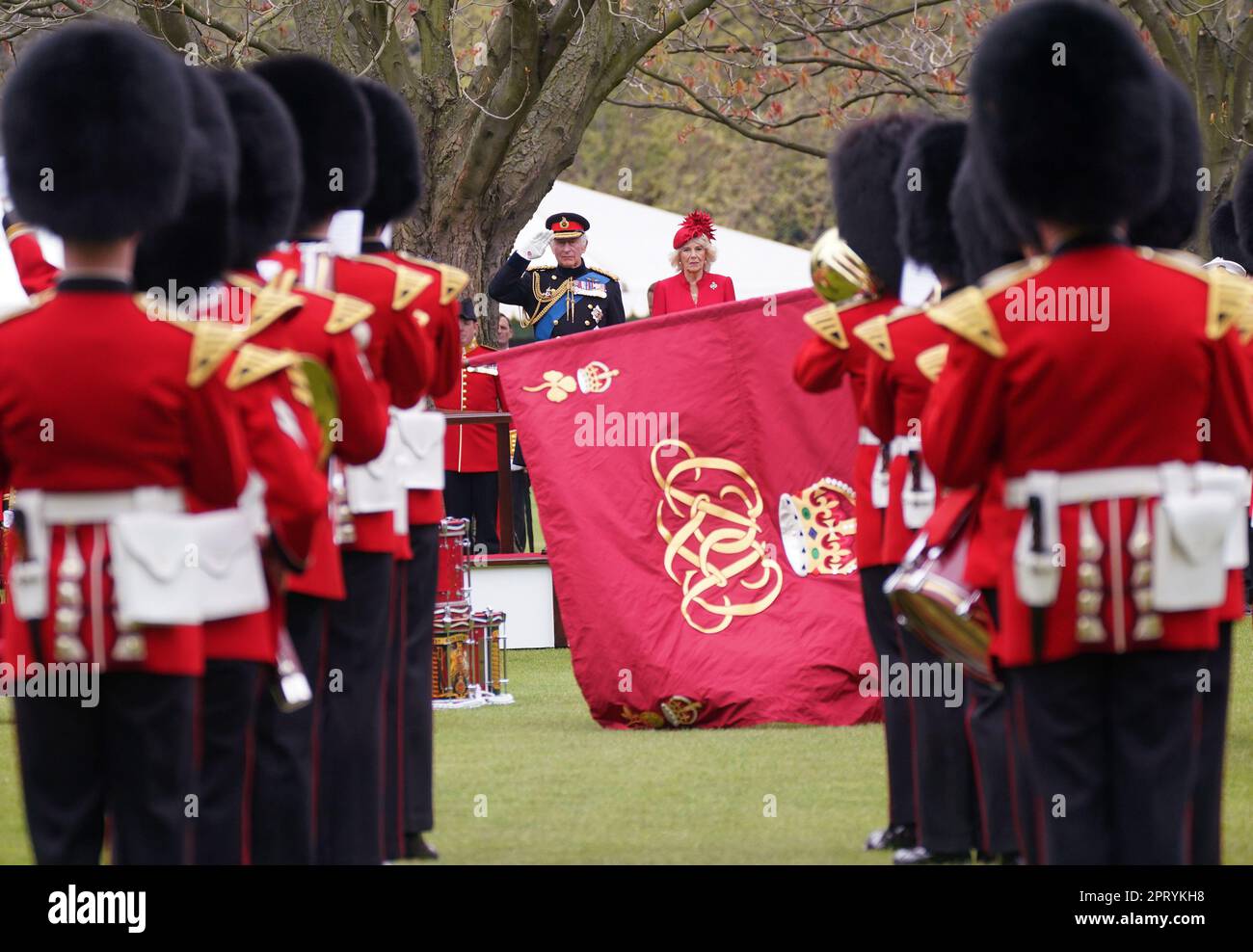 King Charles III and the Queen Consort, receiving a Royal Salute from ...