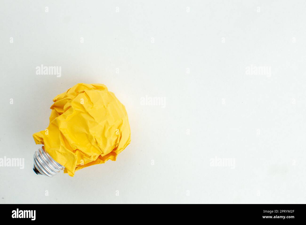 top view yellow idealight bulb on white background copy space Stock ...