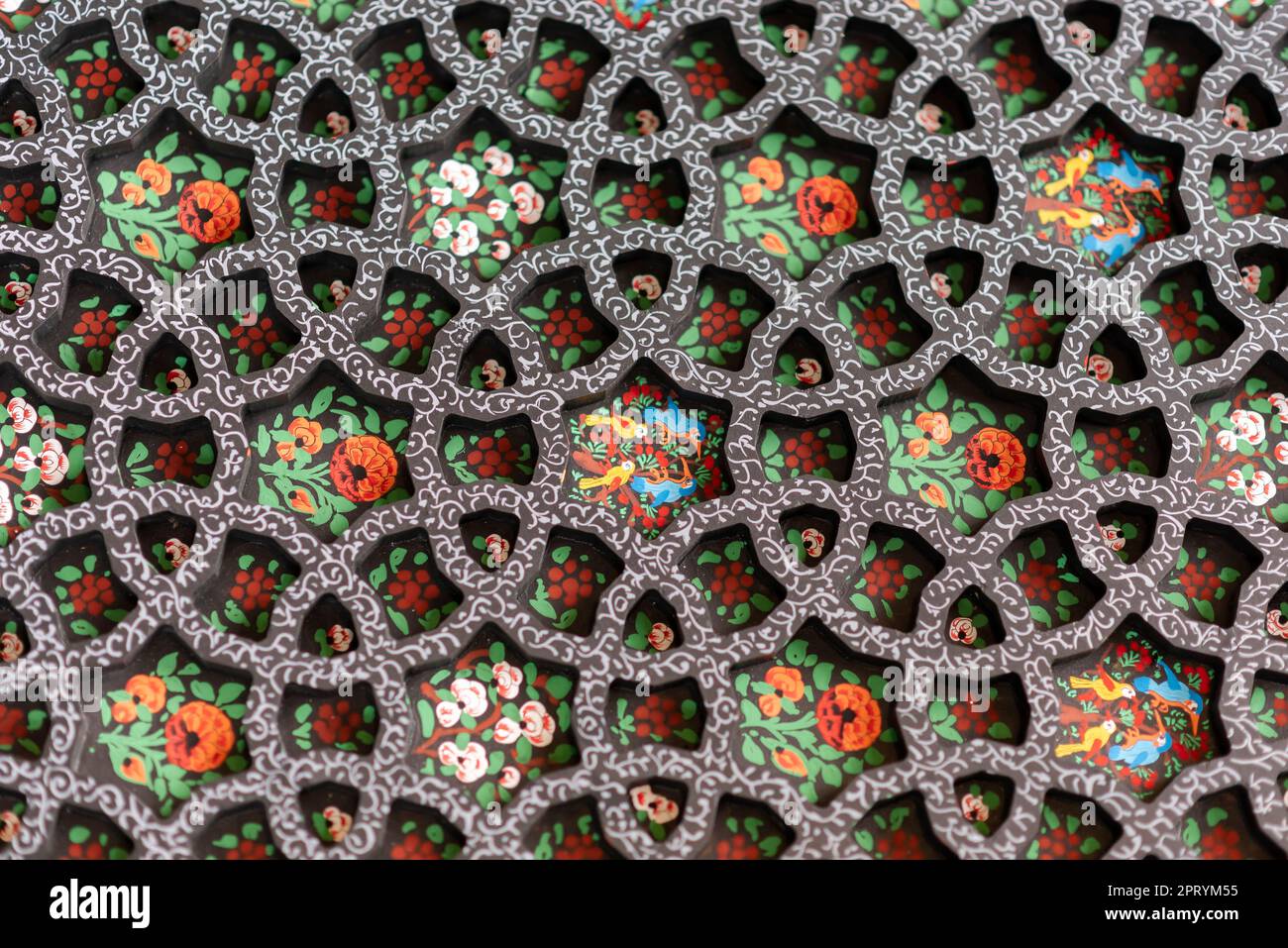 A wall frame decorated with Paper Mache is seen at a workshop in ...