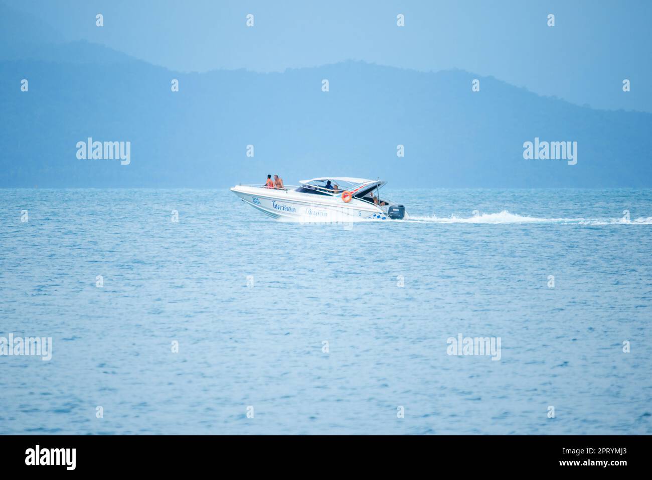 The white speed boat in the sea runs at speed Stock Photo - Alamy