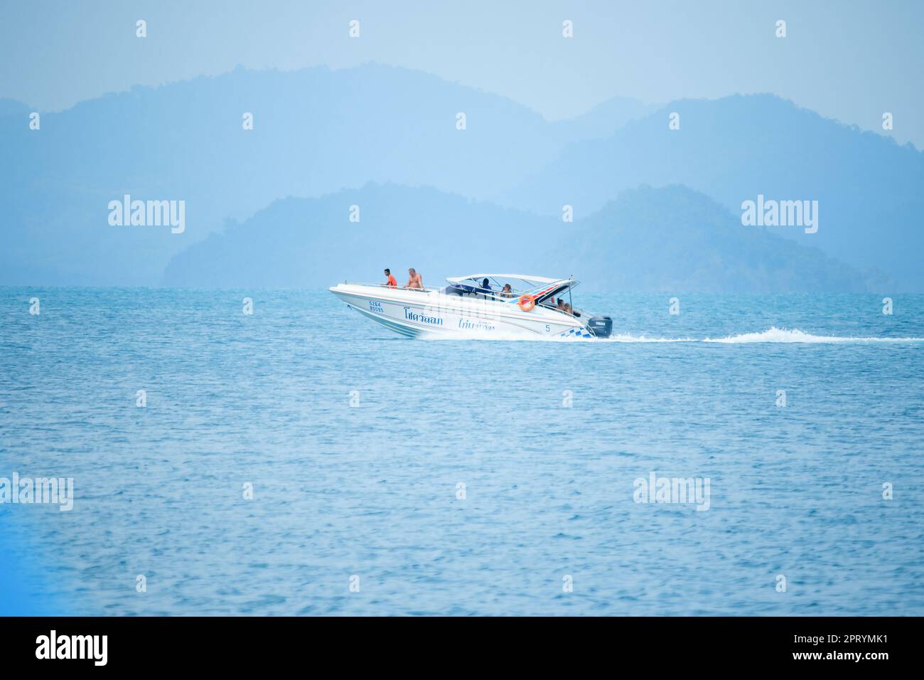 The white speed boat in the sea runs at speed Stock Photo - Alamy