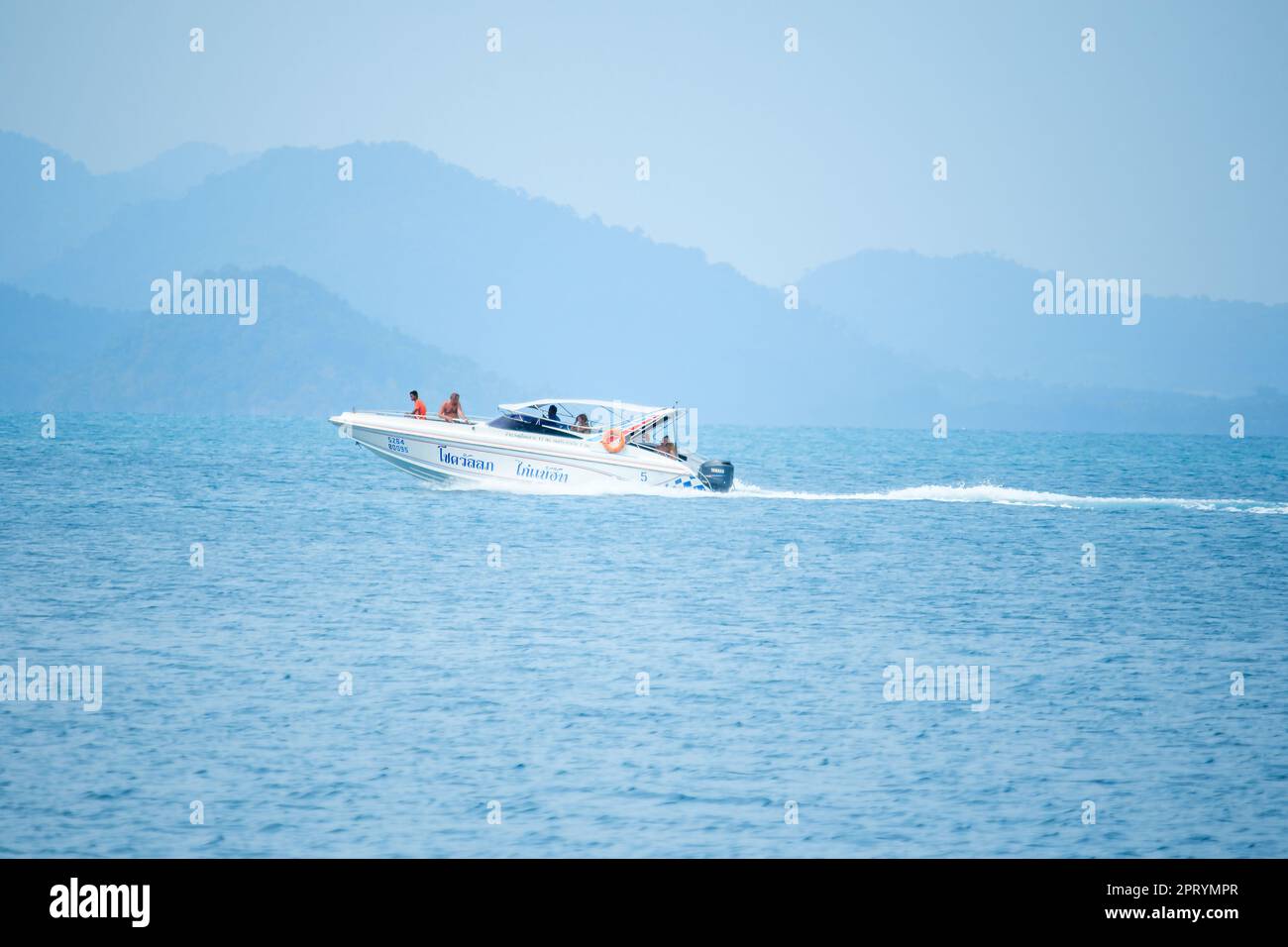 The white speed boat in the sea runs at speed Stock Photo - Alamy