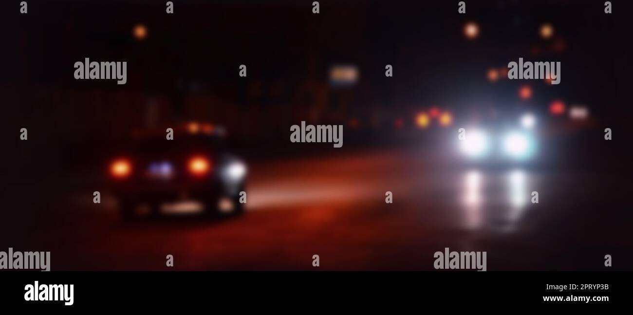 Car approaching traffic lights hi-res stock photography and images - Alamy