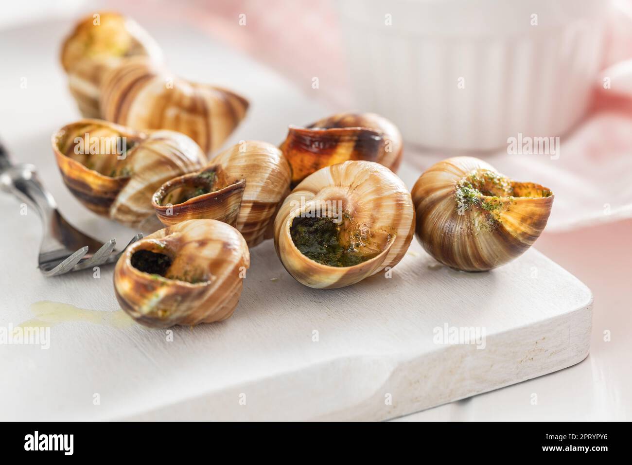 Snails with parsley butter, Bourgogne Escargot Snails on the cutting ...