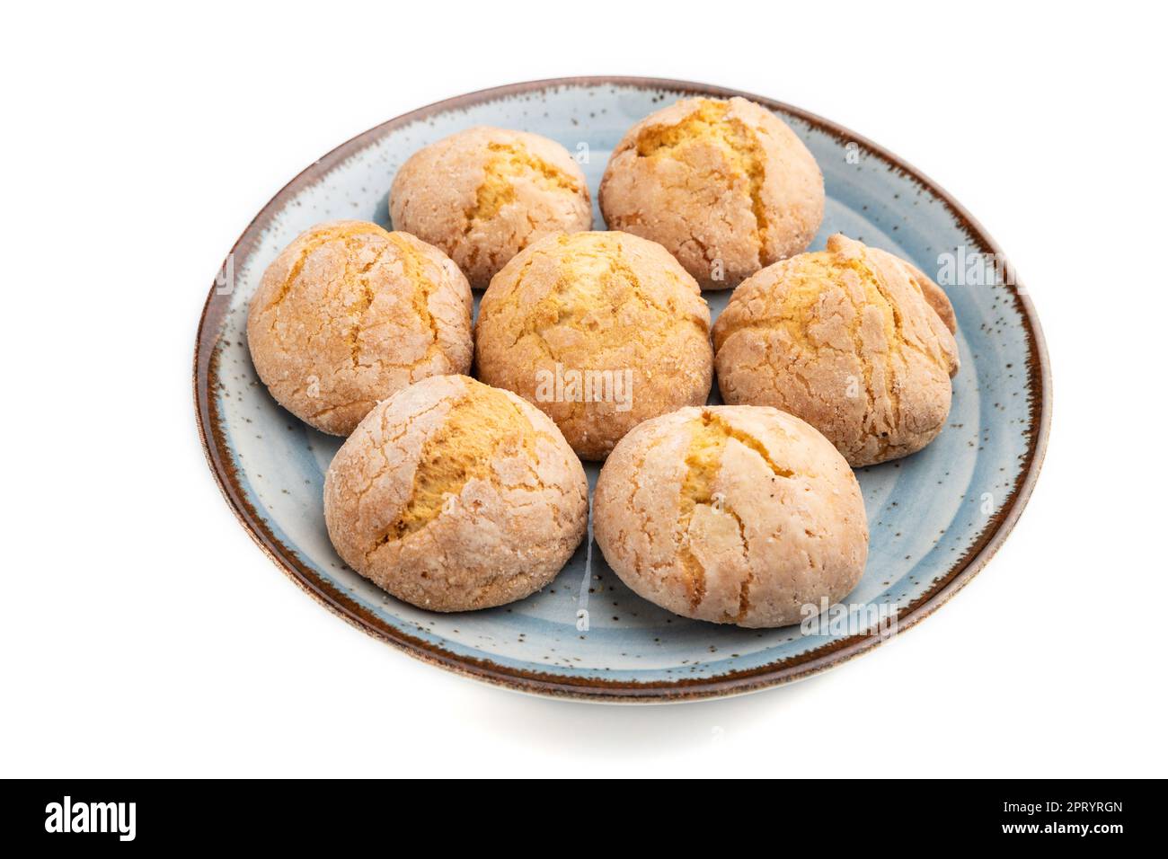 Almond cookies on blue plate isolated on white background. Side view ...