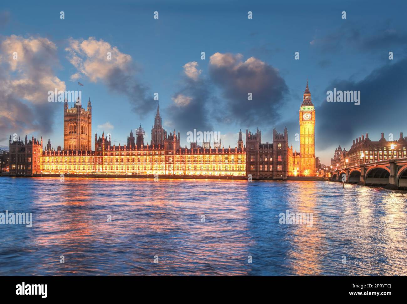 Big Ben and houses of Parliament during a beautiful evening in London ...