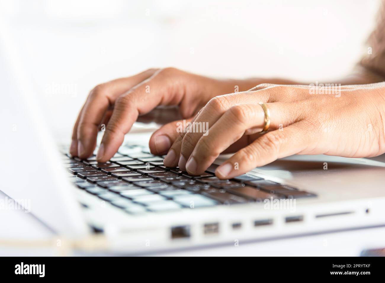 Typing keyboard. Close up Hands of business woman over laptop keypad ...