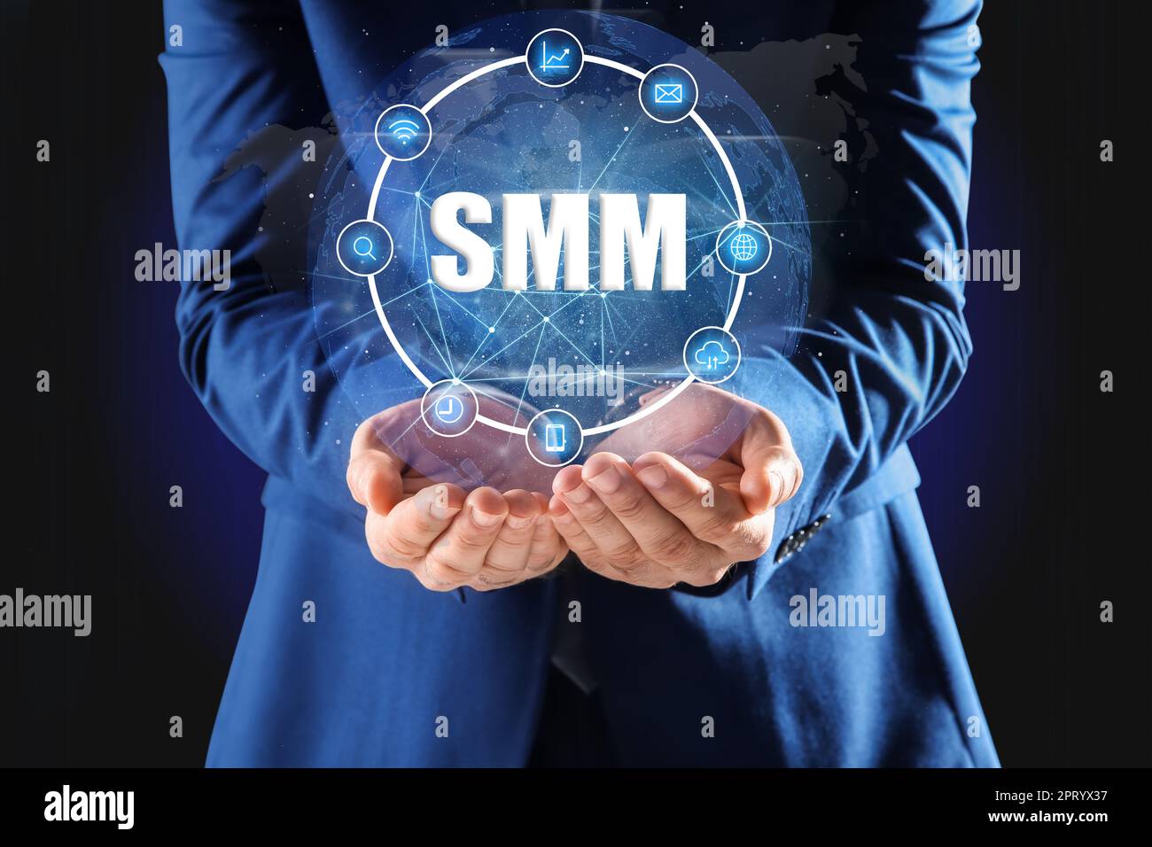 Social media marketing concept. Man holding virtual icon SMM in hands ...