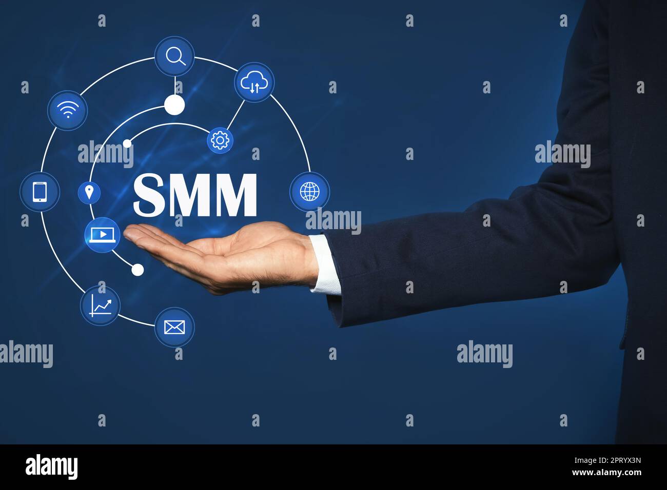 Social media marketing concept. Man holding virtual icon SMM on color ...