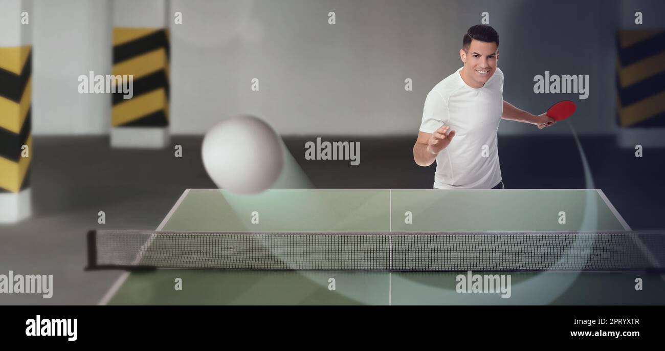 Man playing ping pong in car parking garage. Banner design Stock Photo ...