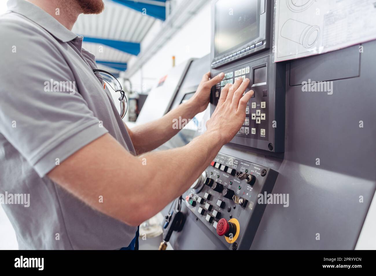 Worker entering data machine hi-res stock photography and images - Alamy
