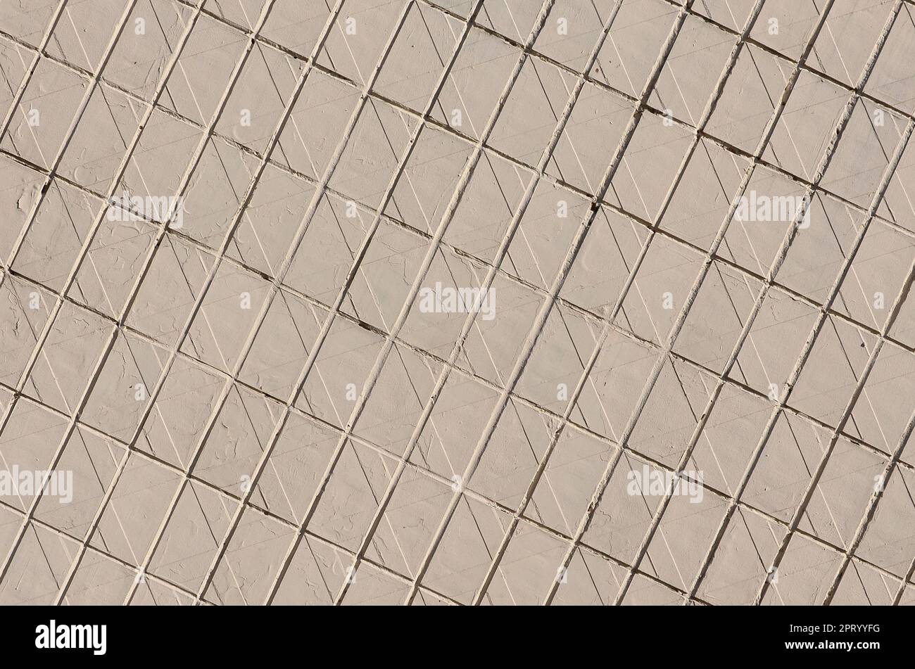 Old Soviet beige wall tiles. The texture of the classical outer tile ...