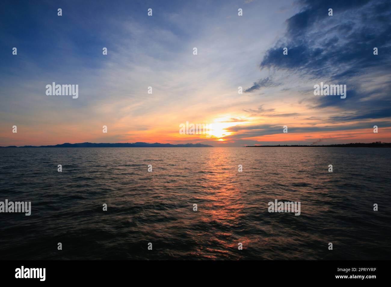 Twilight light of the sunset with beautiful sea landscape Stock Photo ...
