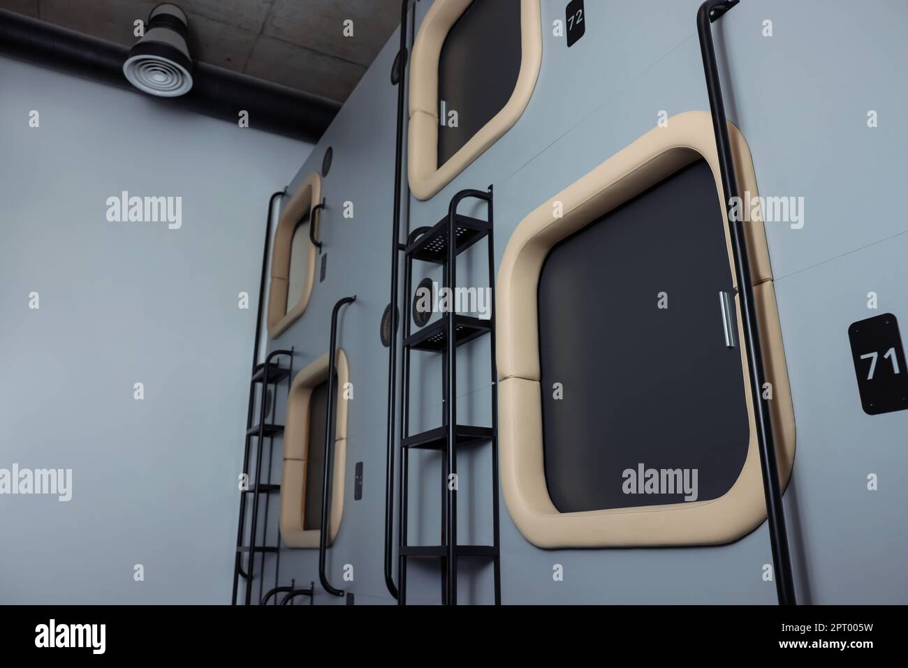 Capsules in modern pod hostel. Stylish interior Stock Photo - Alamy