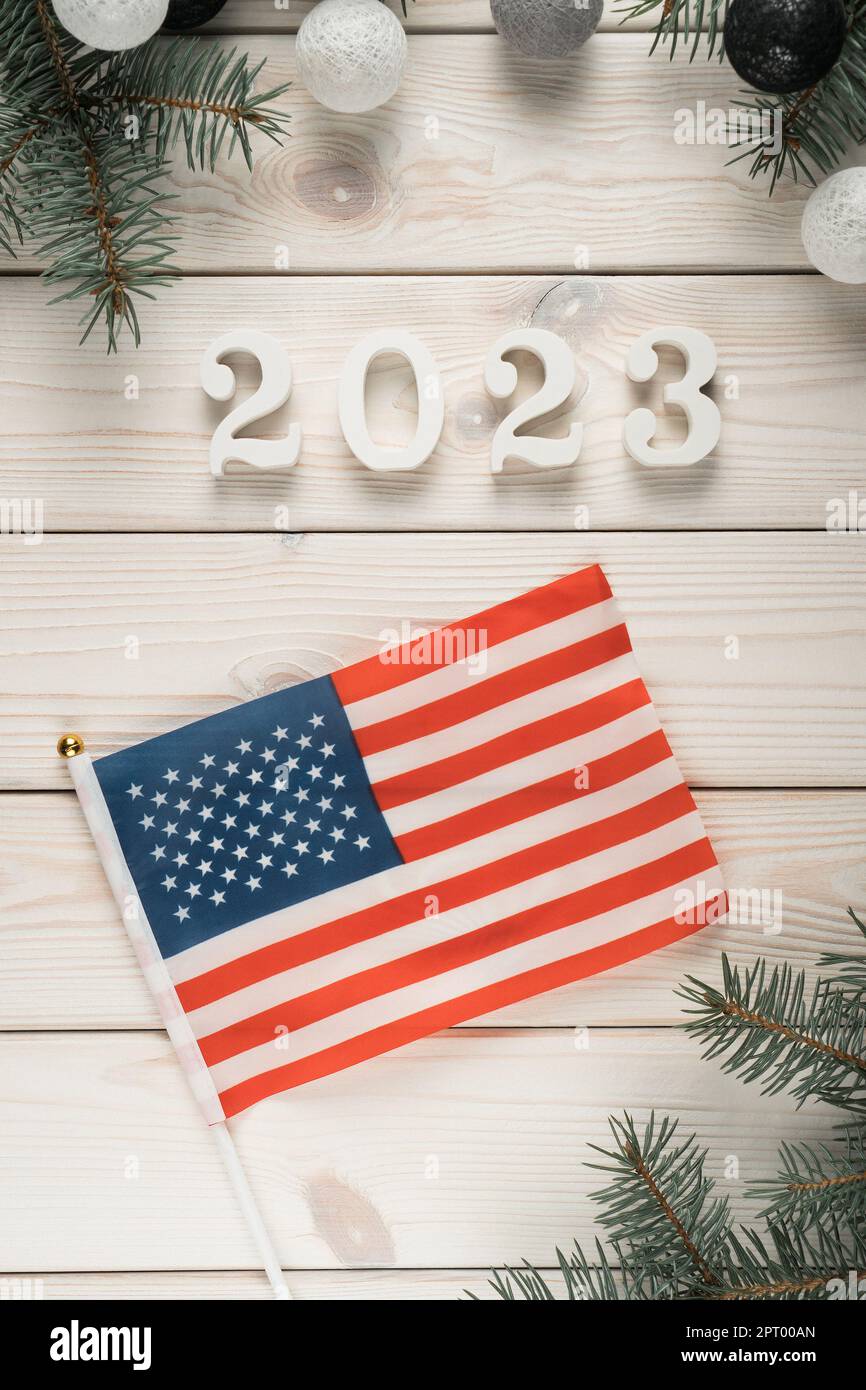 National american flag on table, top view. Frame from organic spruce ...