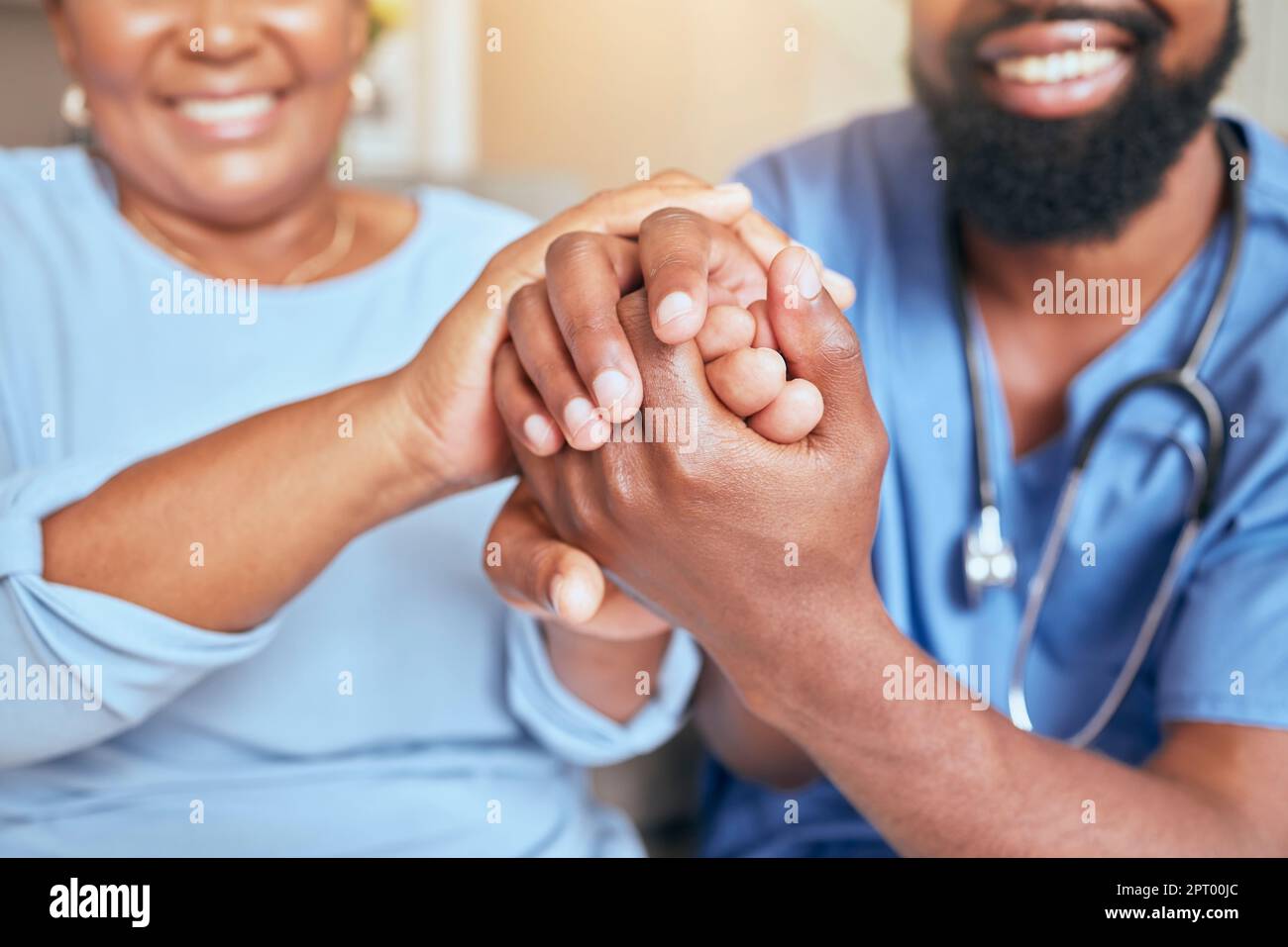 Nurse, holding hands and patient support, kind and care with doctor giving black woman care for ...