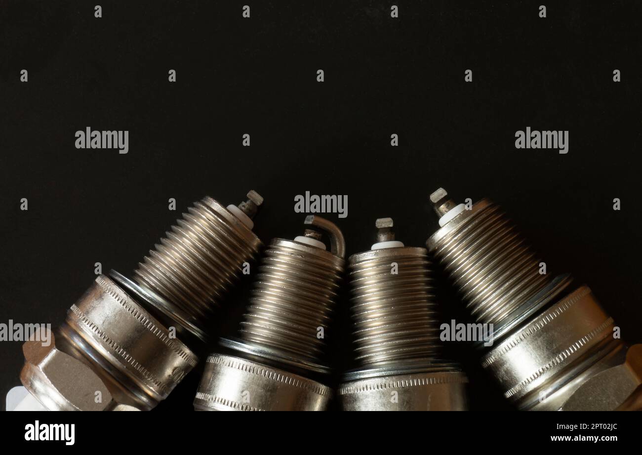 The Car spark plug on dark background. Electric device for car,Space ...