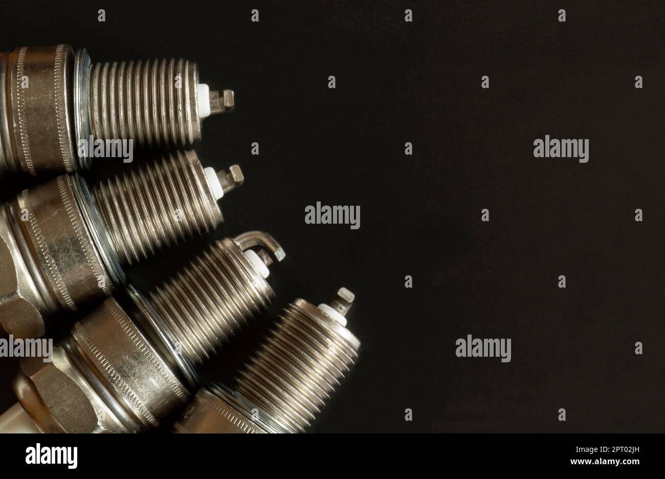 The Car spark plug on dark background. Electric device for car,Space ...