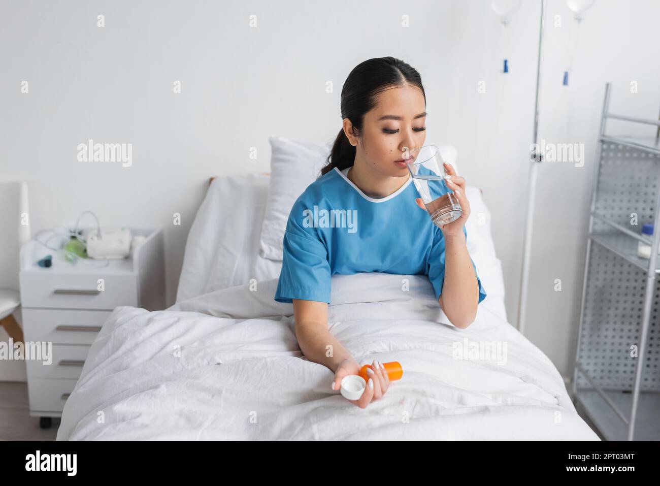 Patient drinking water hospital hi-res stock photography and images - Alamy